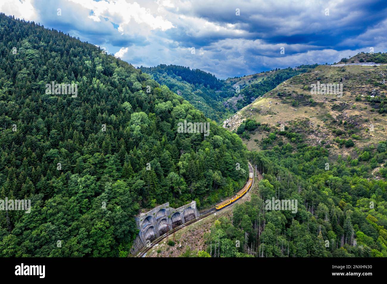 Aerial view of Petit train jaune train in the suspension bridge at Pont ...