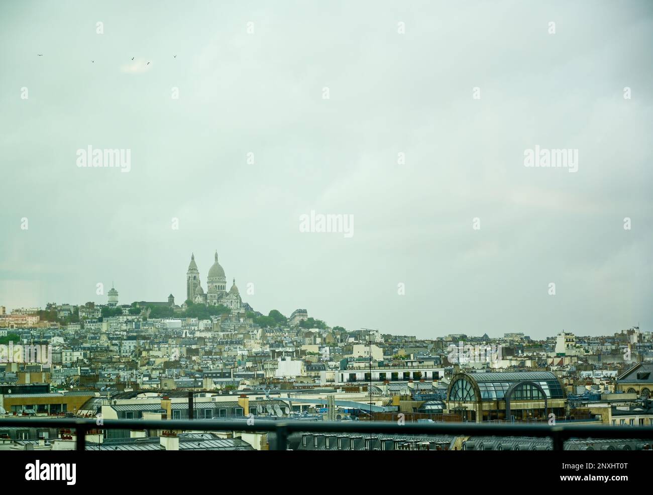 Paris, France, June 2022. Paris skyline with the sacred heart on a ...