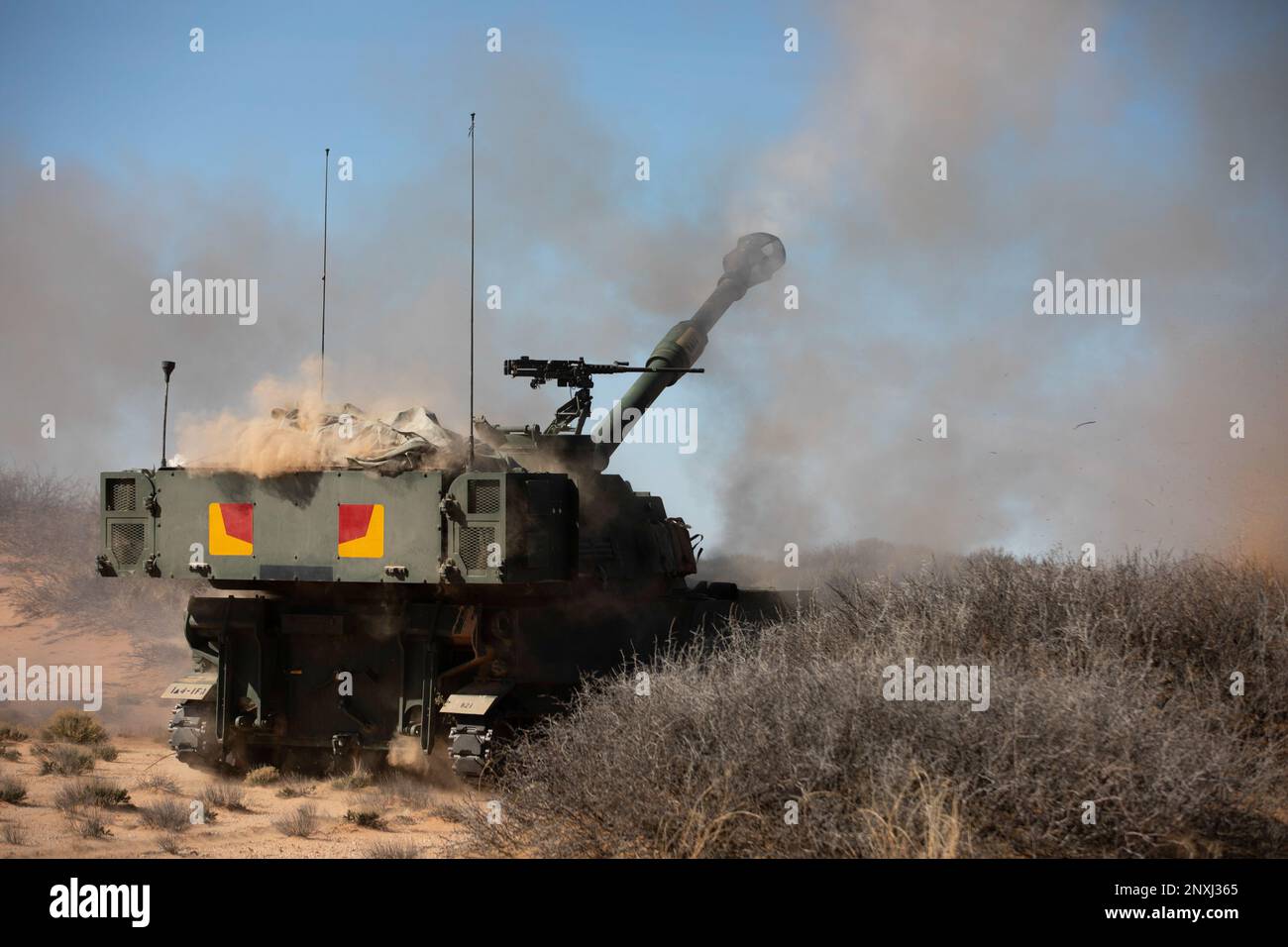 A self-propelled howitzer crew assigned to Bravo Battery, 4th Battalion ...