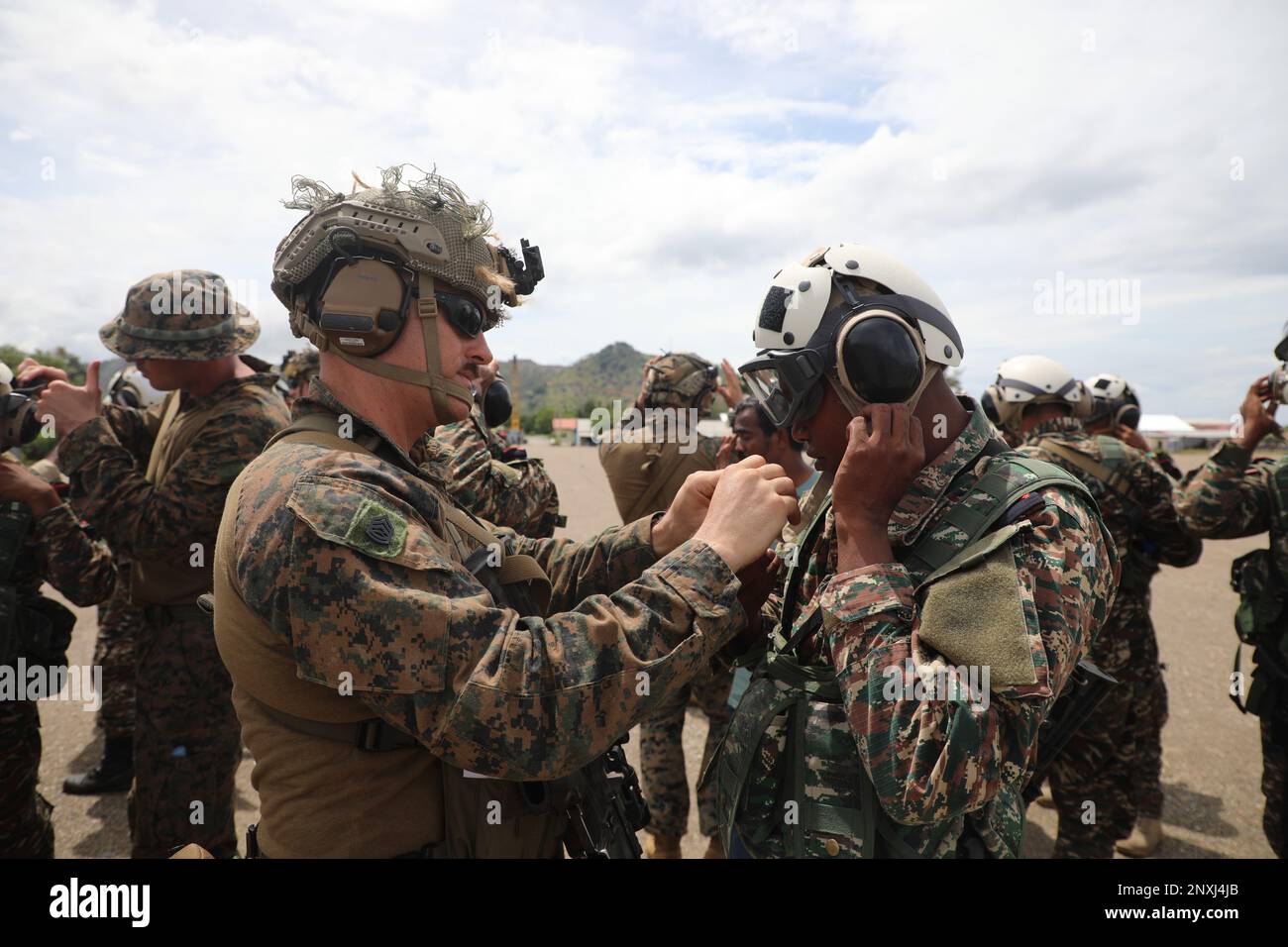 NAVAL BASE HERA, TIMOR-LESTE (Feb. 12, 2023) – U.S. Marine Corps Gunnery Sgt. Adam Crowe, left ...