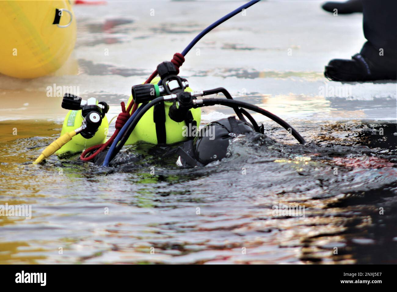 A firefighter with the Directorate of Emergency Services Fire ...