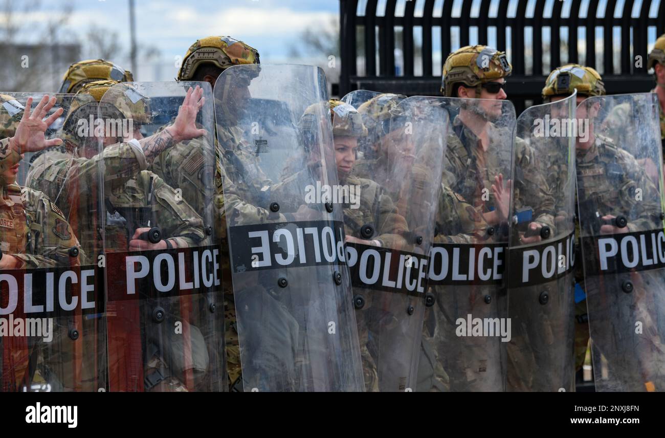 Airmen from the 172nd Security Forces Squadron create a barricade ...