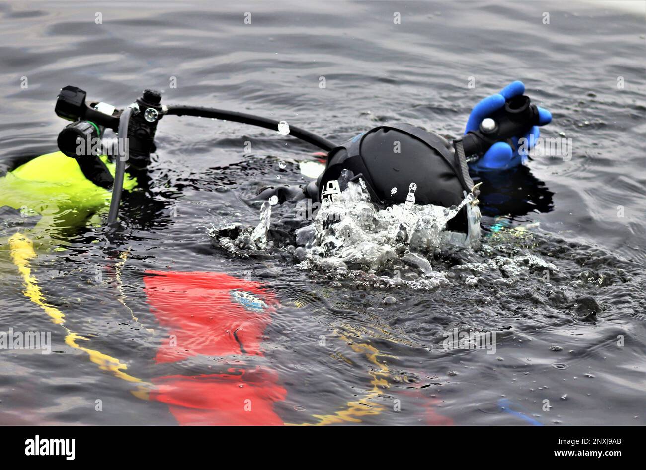 A firefighter with the Directorate of Emergency Services Fire ...