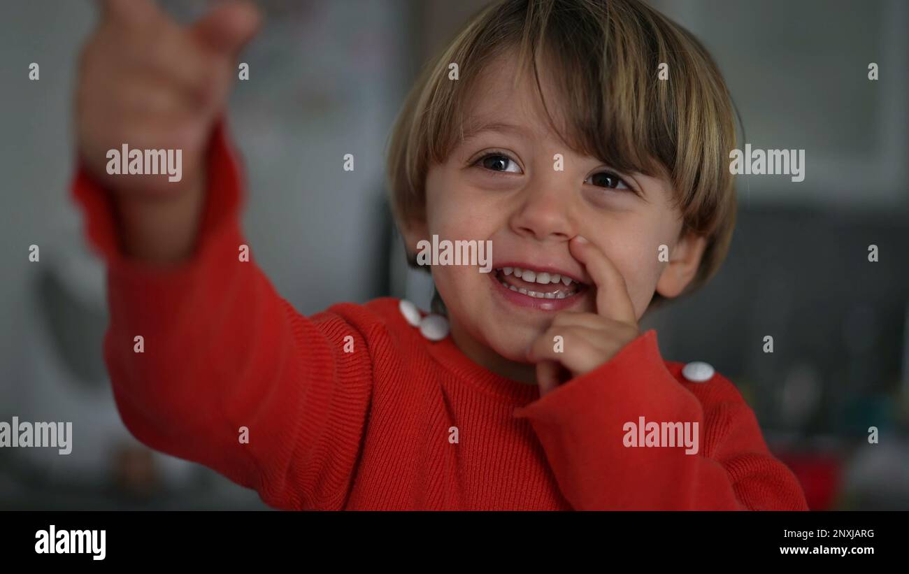 Happy little boy spontaneous laugh. Portrait of a joyful child laughing ...