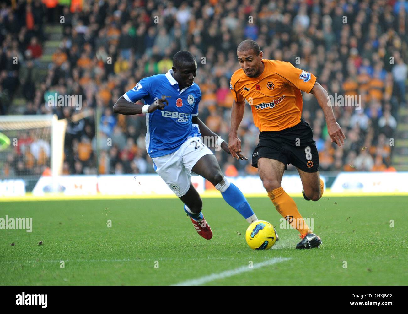 Karl Henry of Wolves and Steve Gohouri of Wigan. Wolverhampton ...