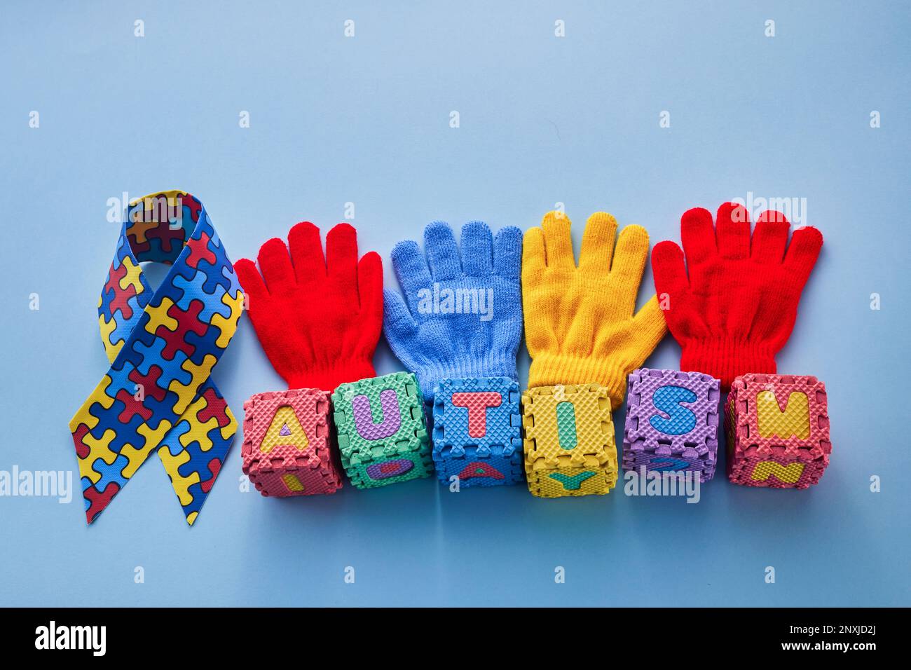 Autism word colorful puzzle hi-res stock photography and images - Alamy