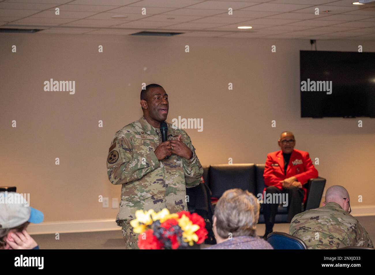 Col. Dolphis Hall, 4th Medical Group commander, speaks to attendees ...