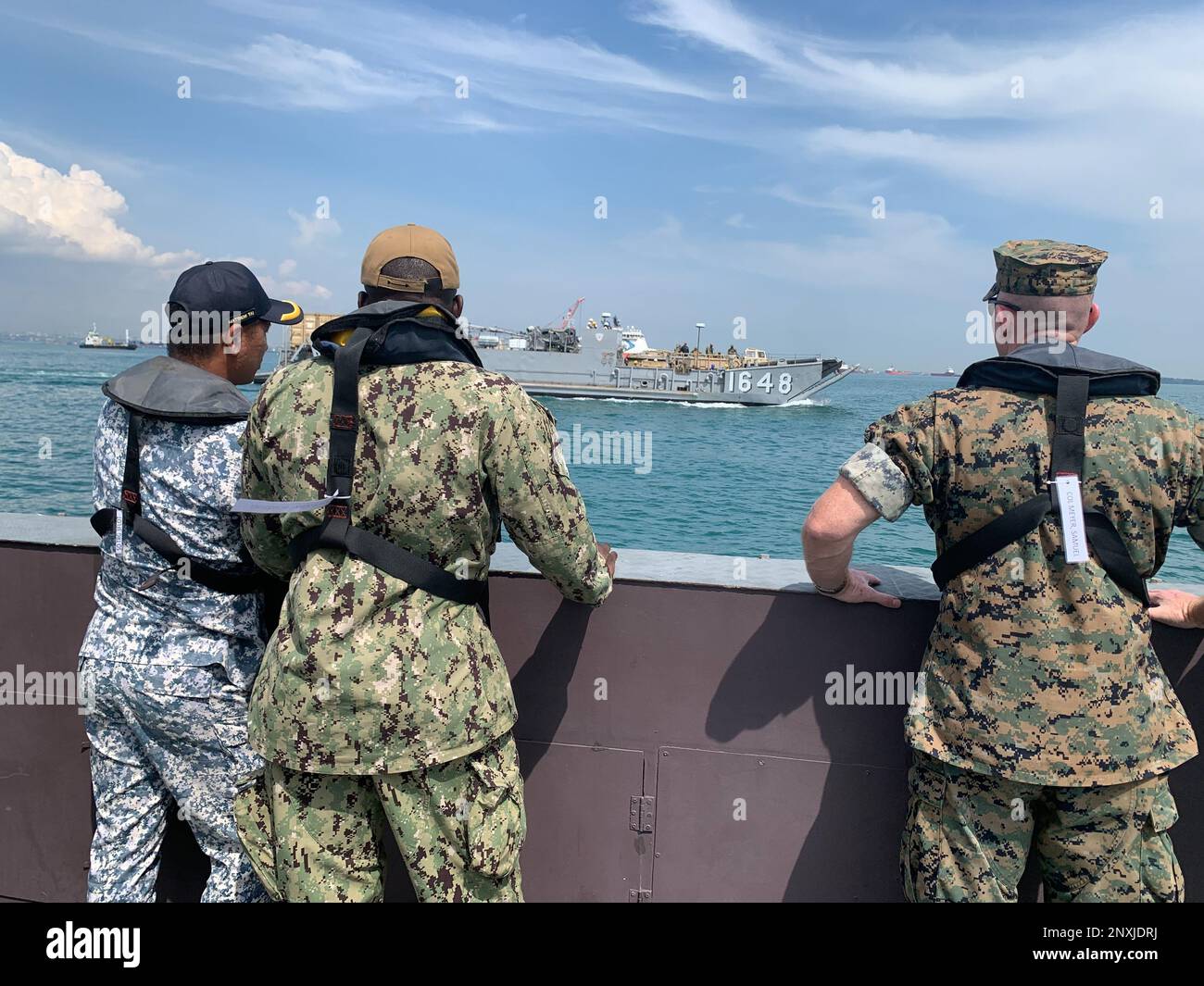 230112-N-YQ414-493 WATERS OFF SINGAPORE (Jan. 12, 2023) Officers from ...