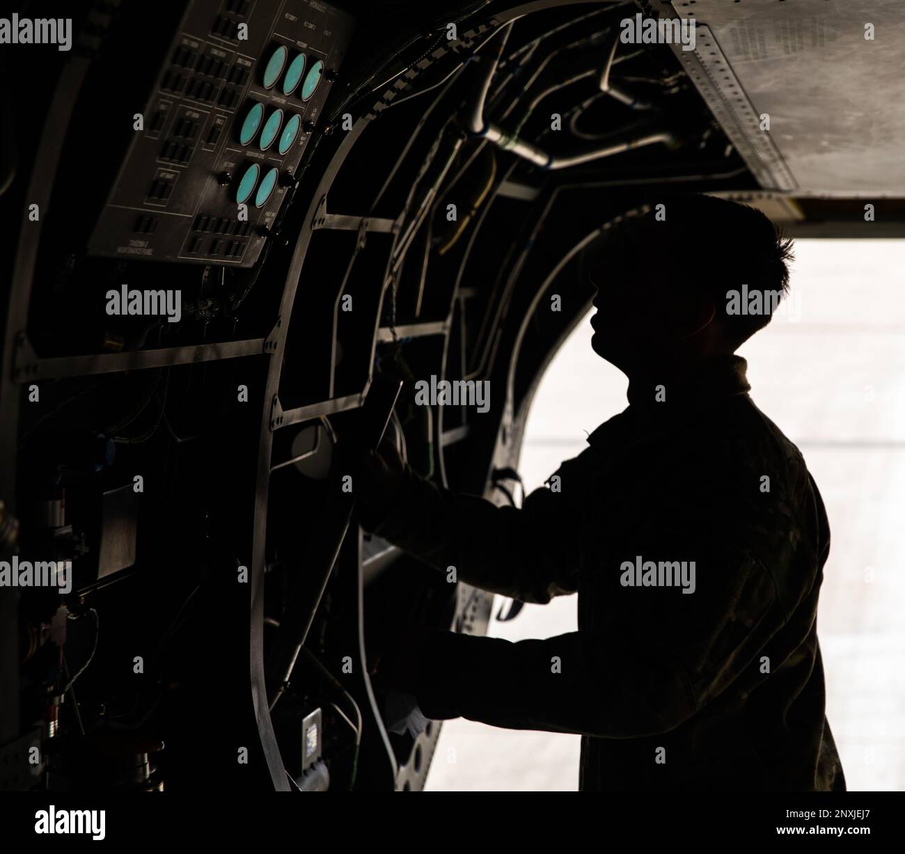 U.S. Army Sgt. Keith Candiano, a CH-47 helicopter mechanic assigned to ...