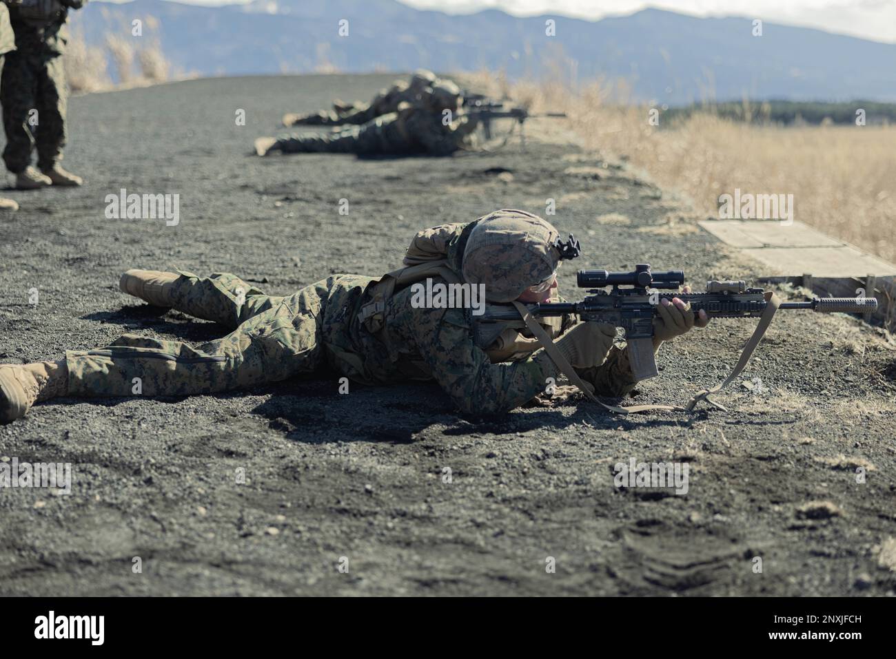 U.S. Marine Corps Lance Cpl. Andy Godinez, a rifleman with 3d Battalion ...