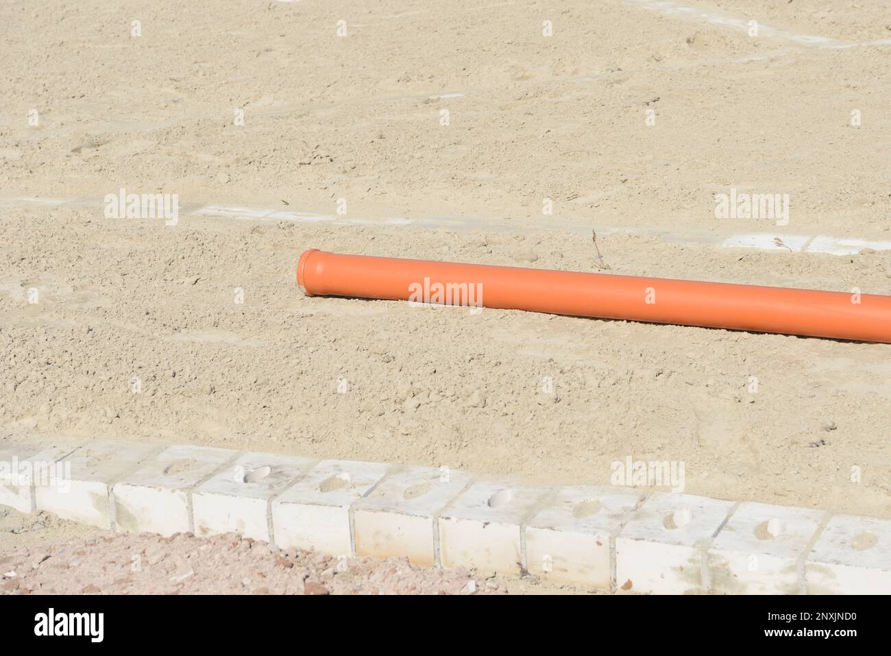 Waste water pipe on the filling sand of a new building before ...