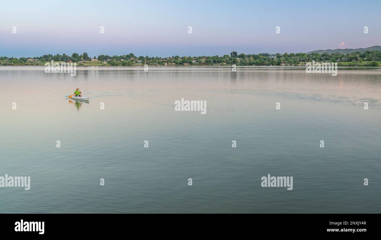 evening canoe paddling on one of numerous reservoirs along Front Range ...
