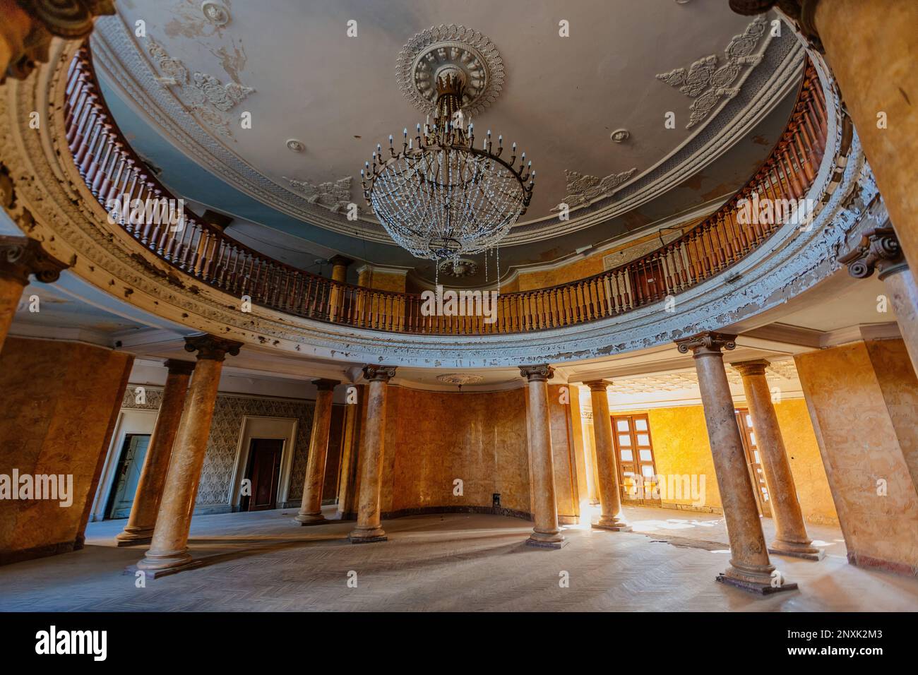 Entrance round hall with chandelier at the abandoned palace Stock Photo ...