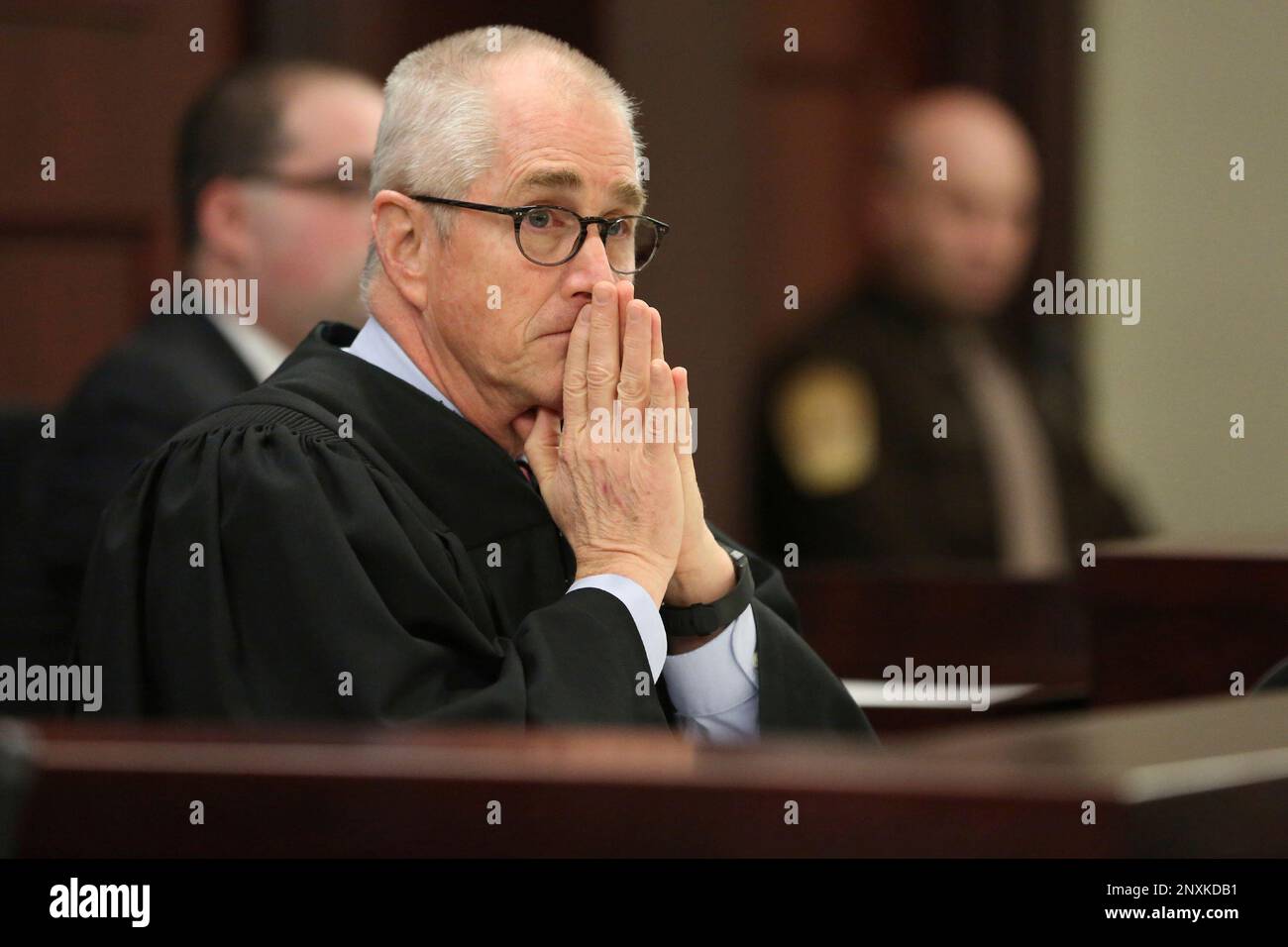 Judge Robert Turk listens as attorneys speak in Montgomery County ...