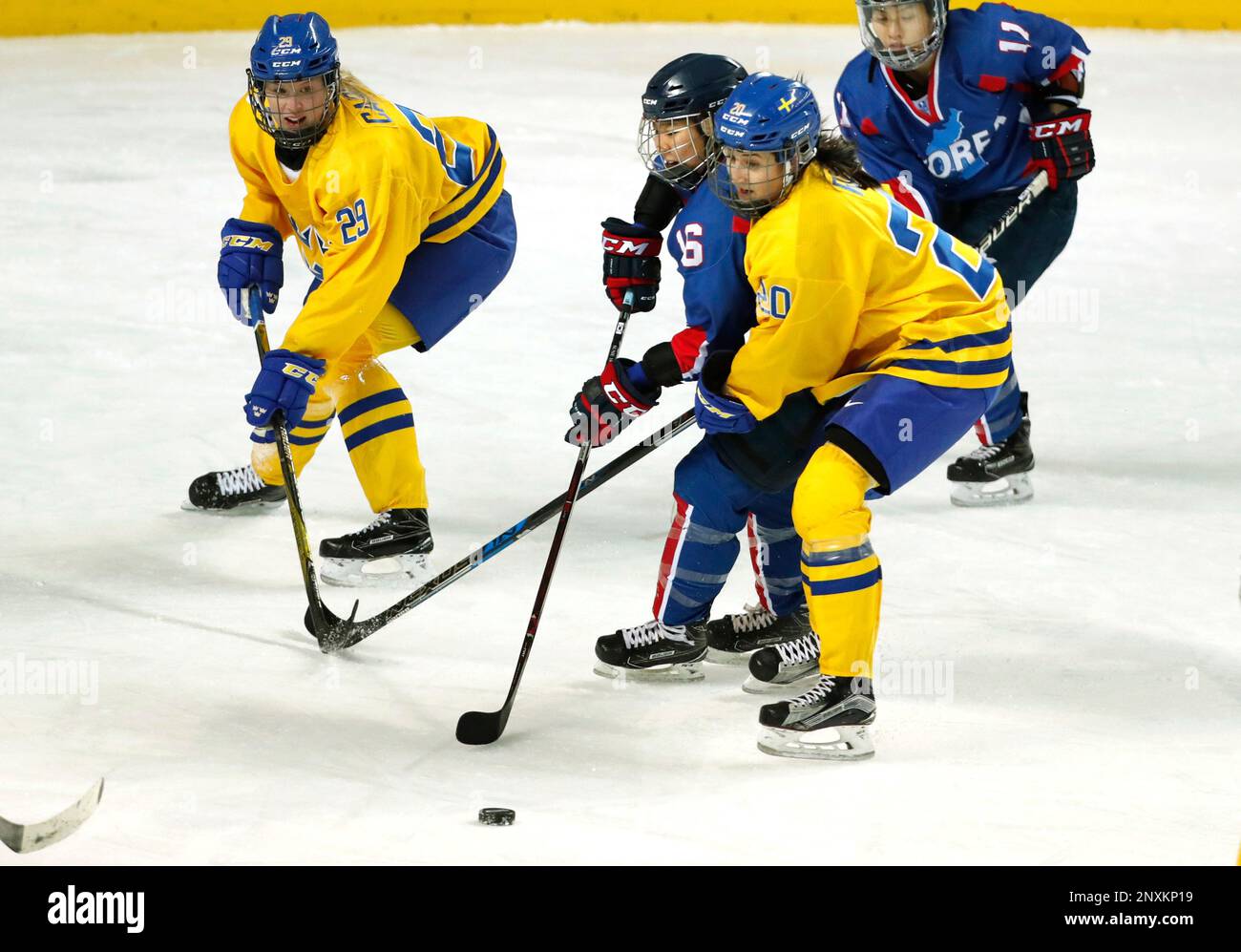 Combined Koreas' Ryo Song Hui (16) and Sweden's Fanny Rask, right ...