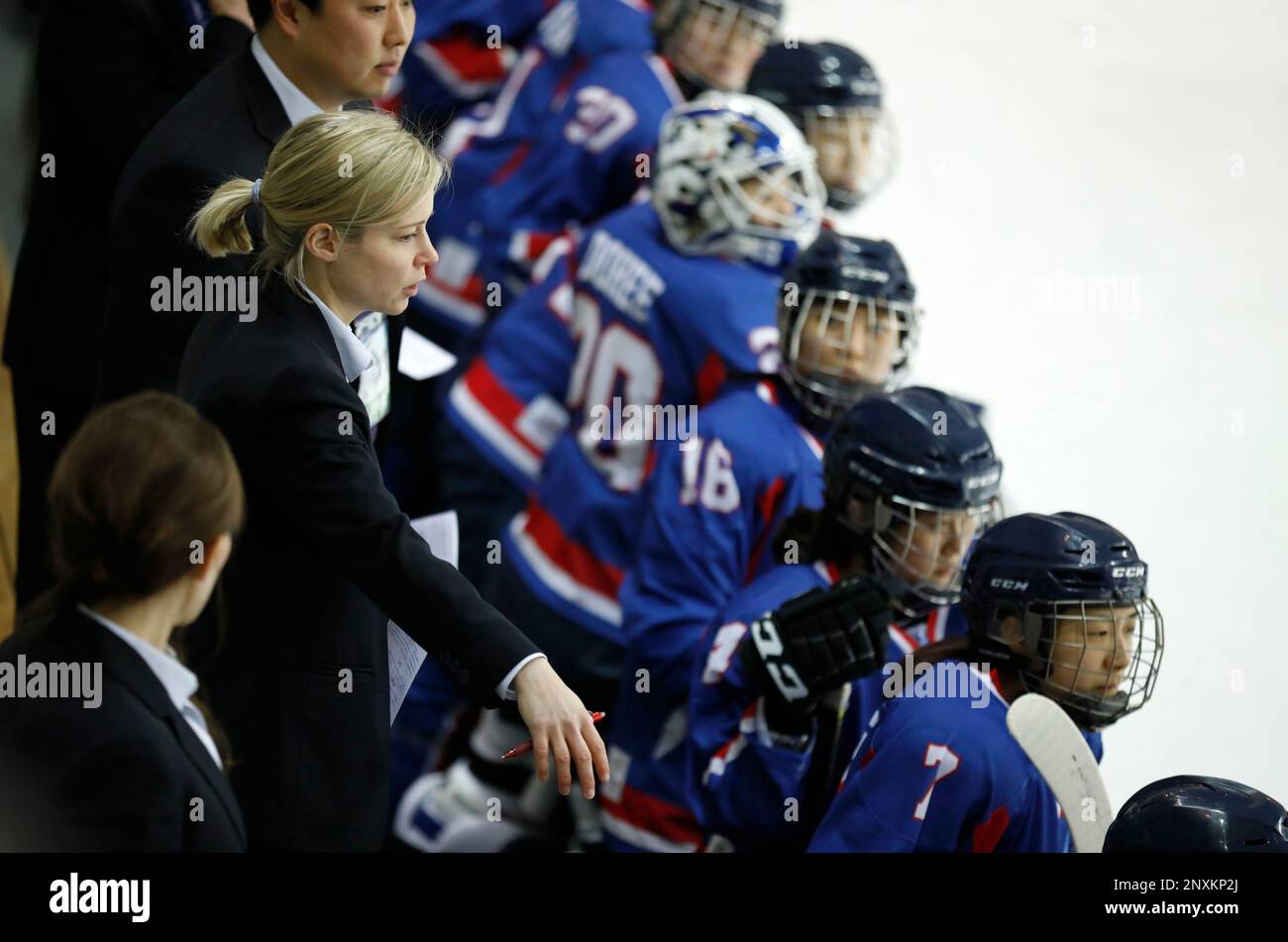 Combined Koreas head coach Sarah Murray, left, watches a women's ice ...