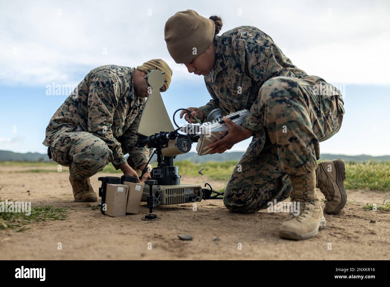 U.S. Marine Corps Sgt. Mariah Pandis, right and Sgt. Austin ...