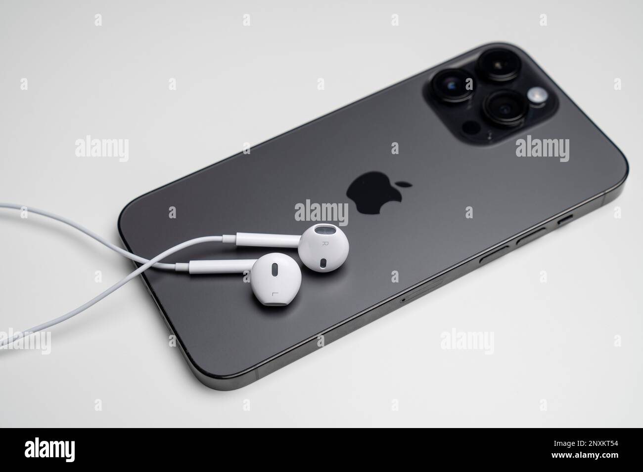 Apple iPhone 14 Pro Max, Space Black, smartphone back view. Next to it ...