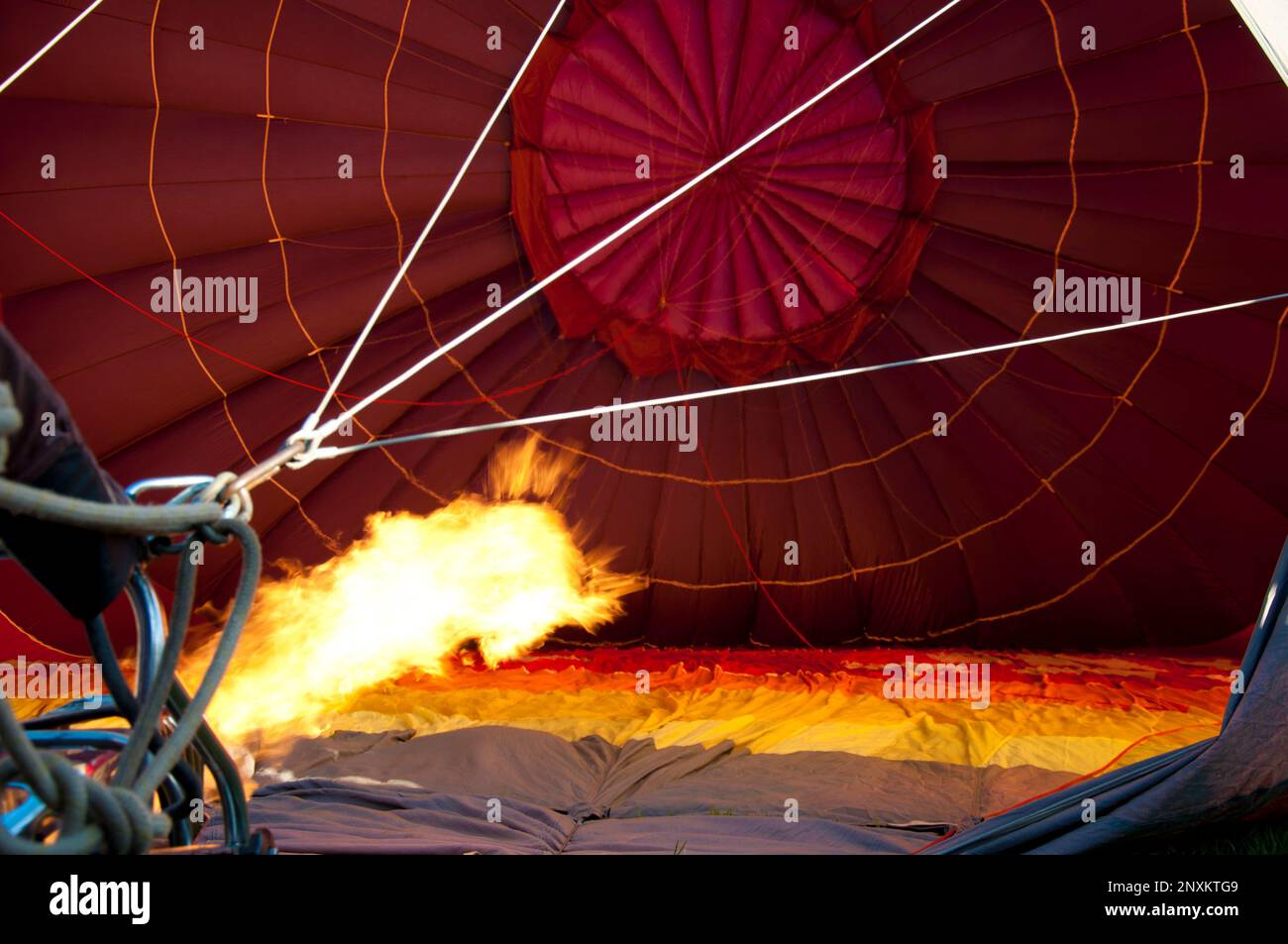 ballooning, view of the flame inside of a hot air balloon being ...