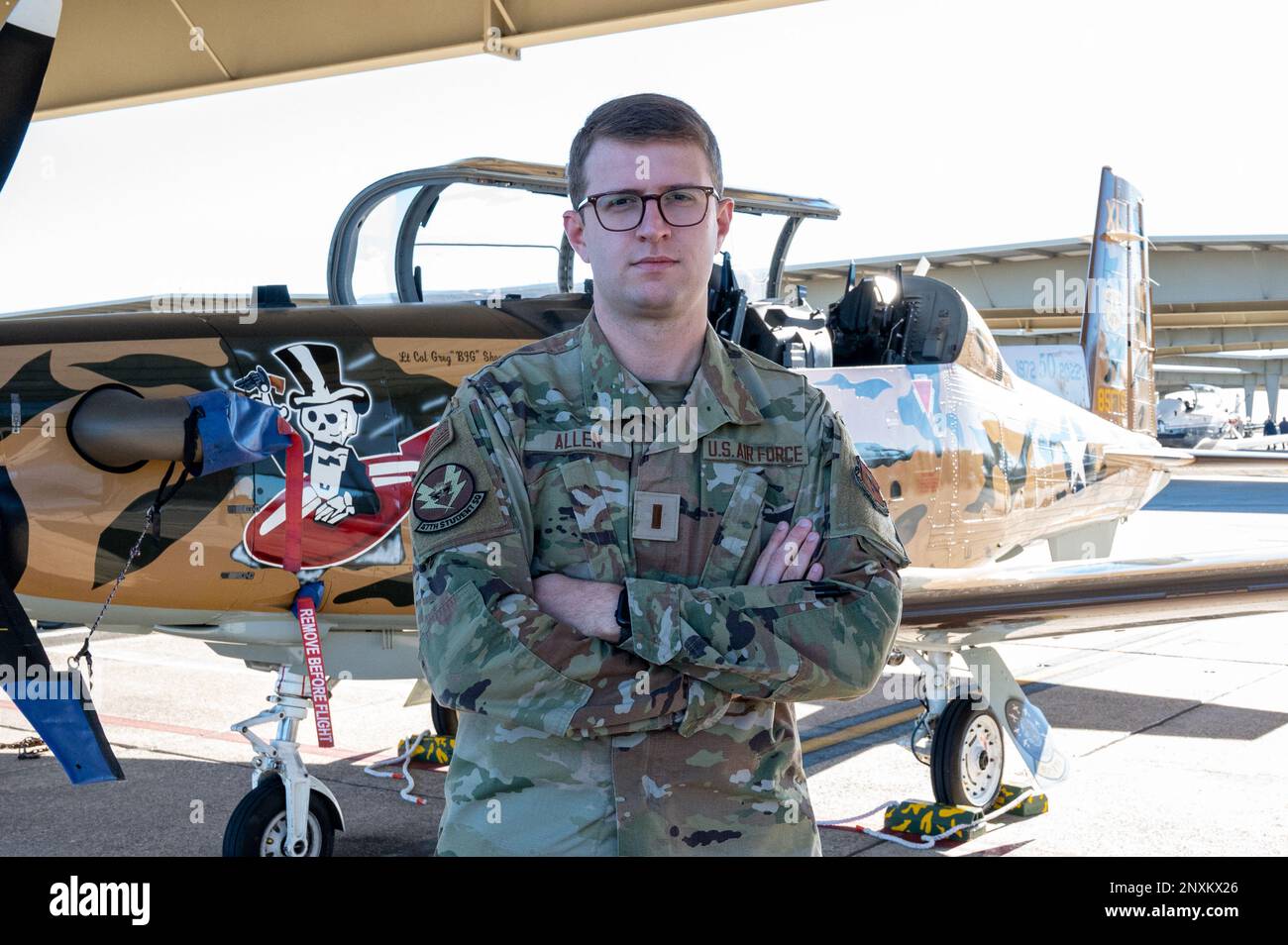 U.S. Air Force 2nd Lt. Garret Allen poses in front of a T-6A Texan II ...
