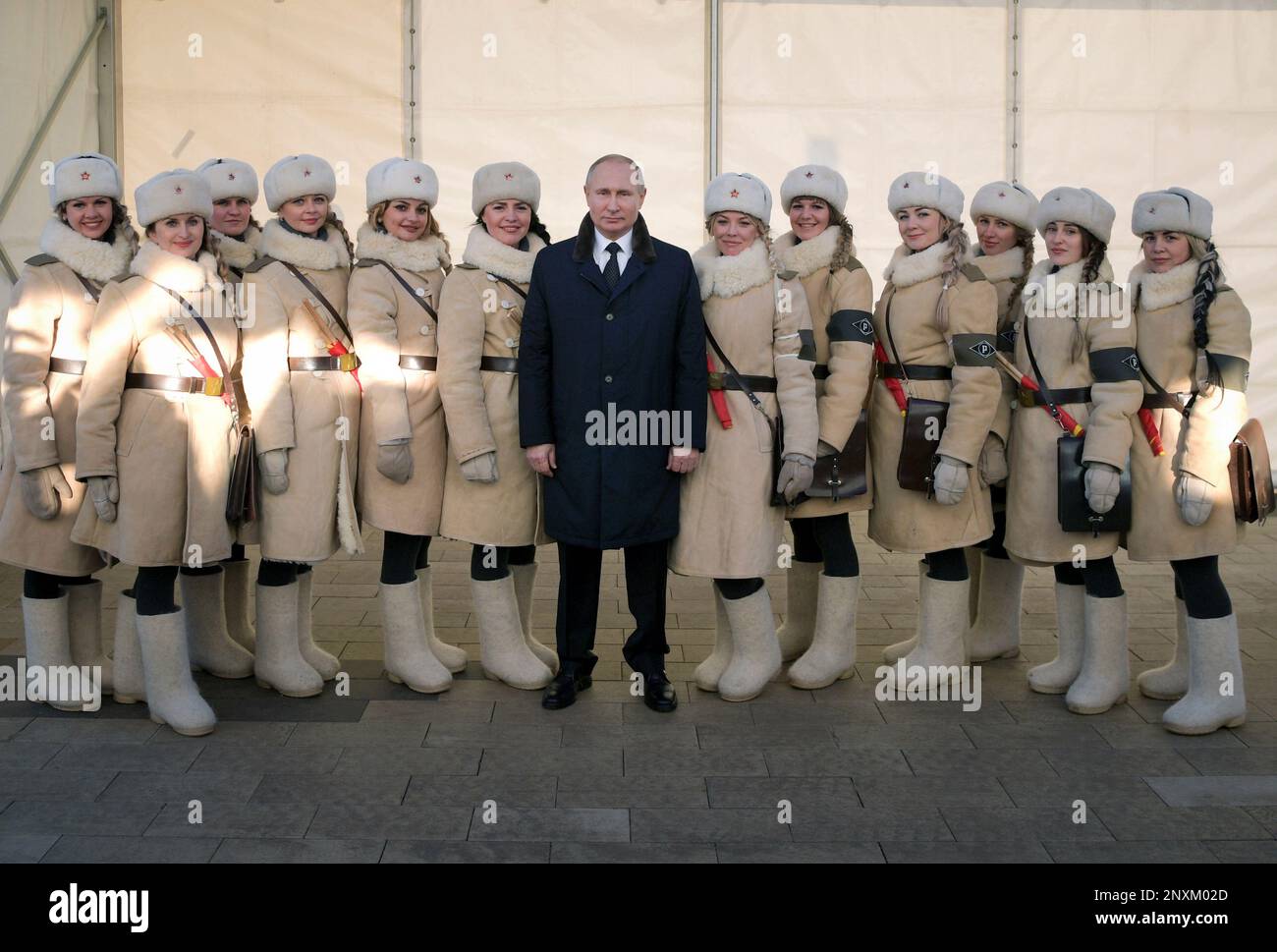 President Vladimir Putin, center, poses for a picture alongside with ...
