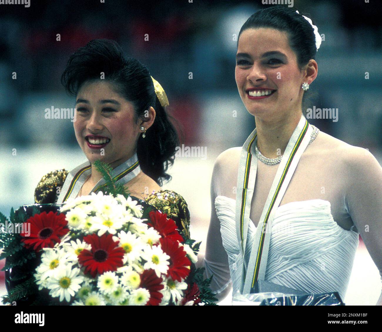 Kristi Yamaguchi and Nancy Kerrigan share the medal stand at 1992 ...