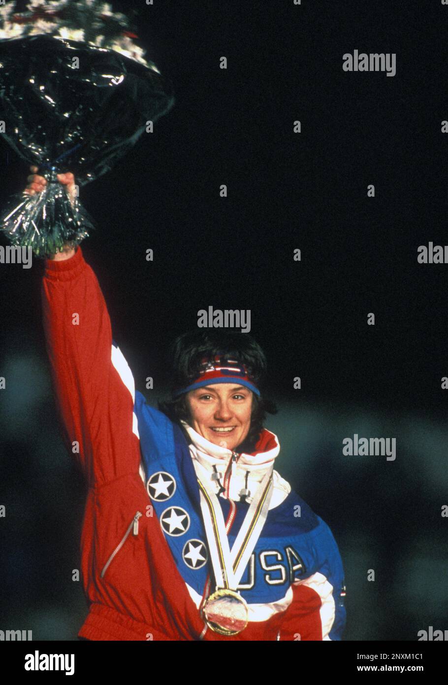 Speedskater Bonnie Blair of the United States salutes the crowd from ...