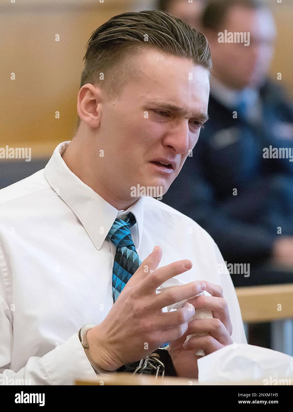 Colter Peterson cries while listening to testimony during his ...