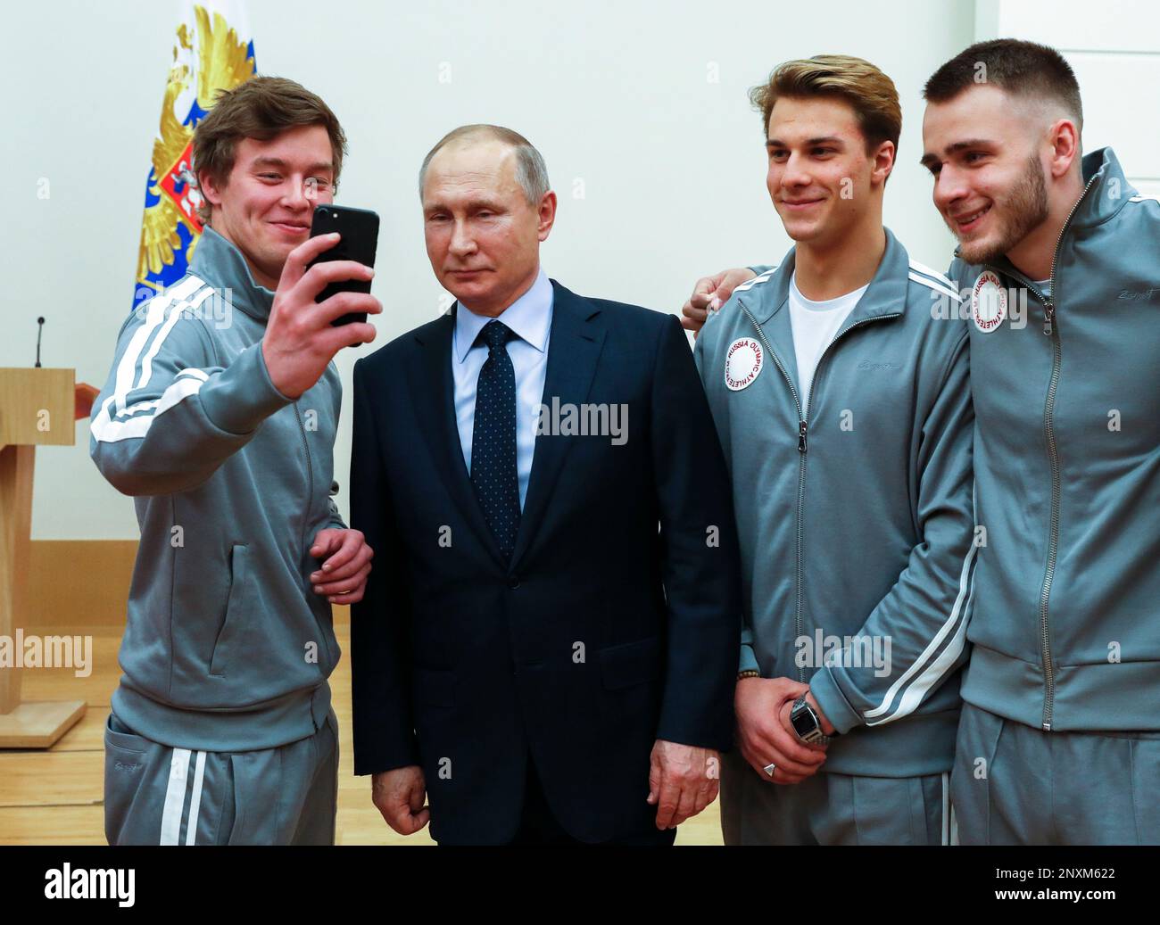 Russian President Vladimir Putin, second left, poses for a photo with ...