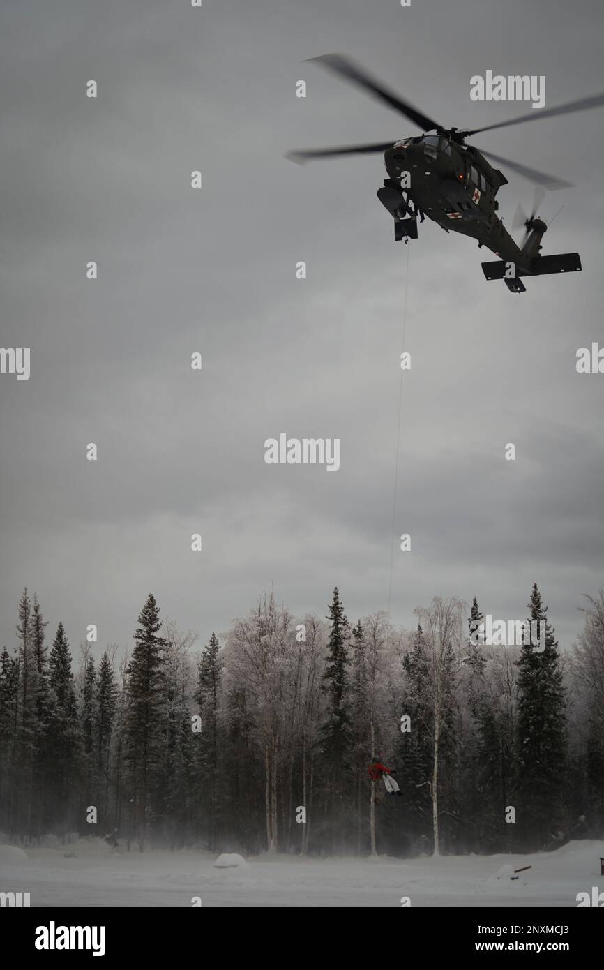 Alaska Army Guard Spc. Matthew Tucker, a flight medic assigned to Golf ...