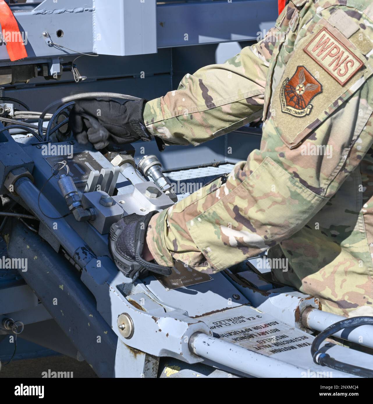Airmen assigned to the 509th Aircraft Maintenance Squadron perform ...