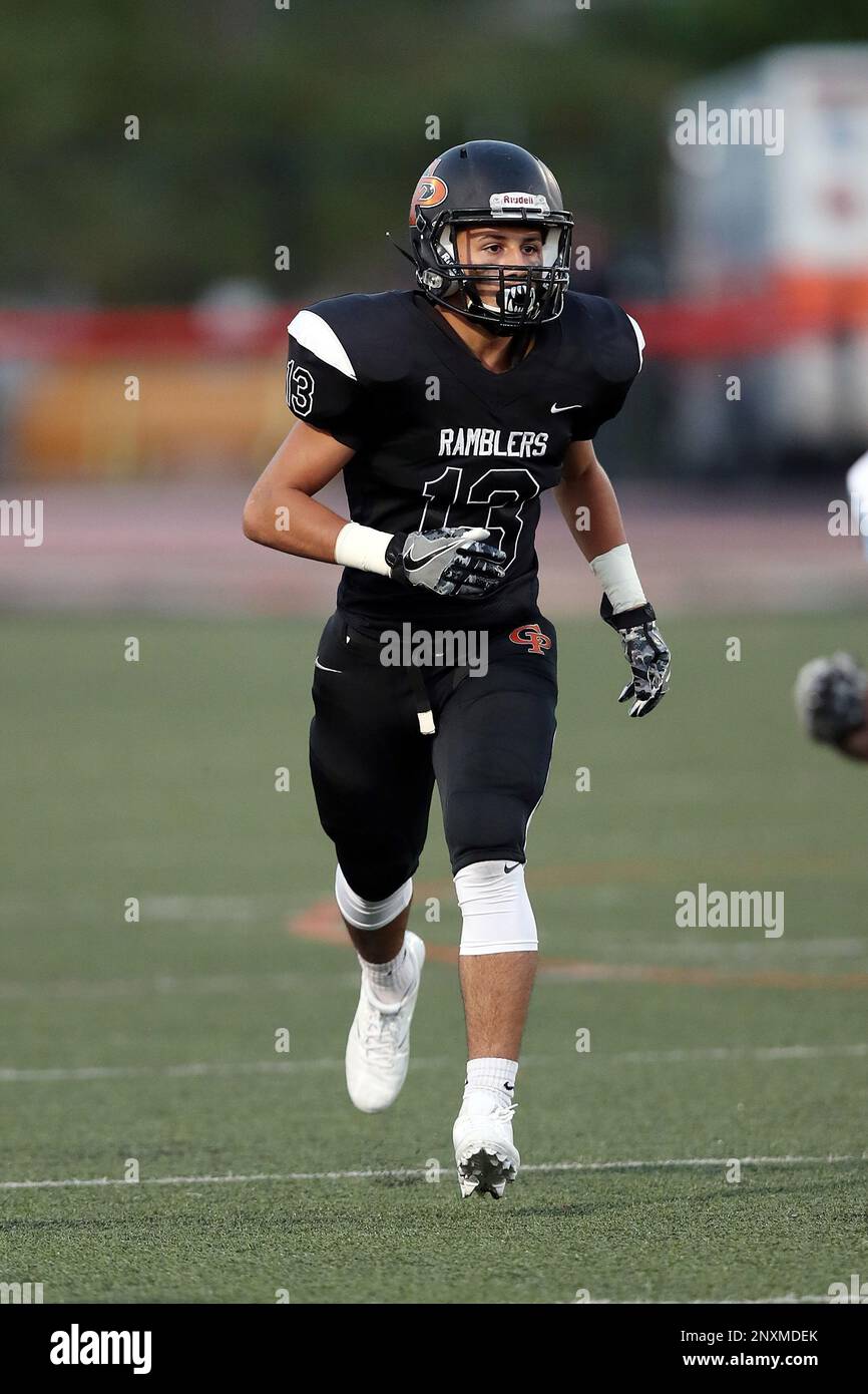 Erie Cathedral Prep Ramblers defensive back Skyler Neely (13) runs down ...