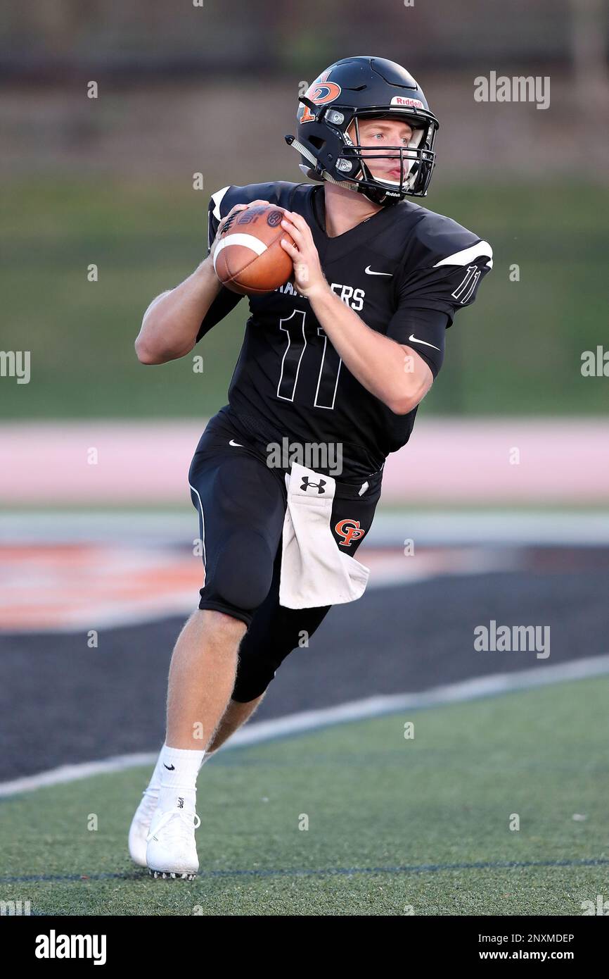 Erie Cathedral Prep Ramblers quarterback Joseph Mischler (11) rolls ...