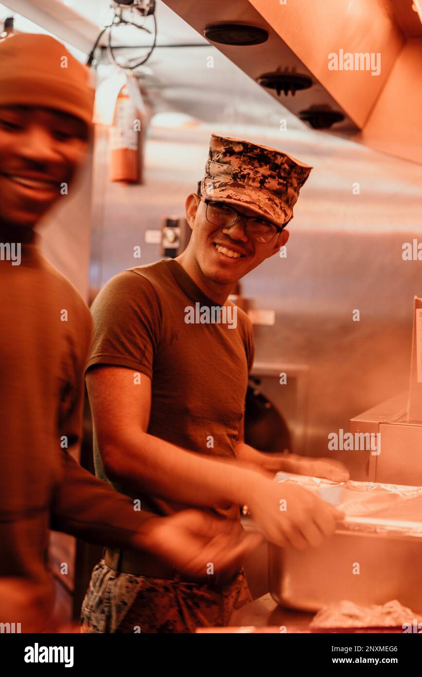 U.S. Marine Corps Cpl. Loc Nguyen, a food service specialist with ...