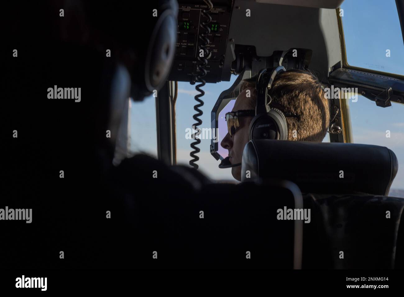 U.S. Air Force 1st Lt. Ethan Reed, 37th Airlift Squadron copilot, flies ...
