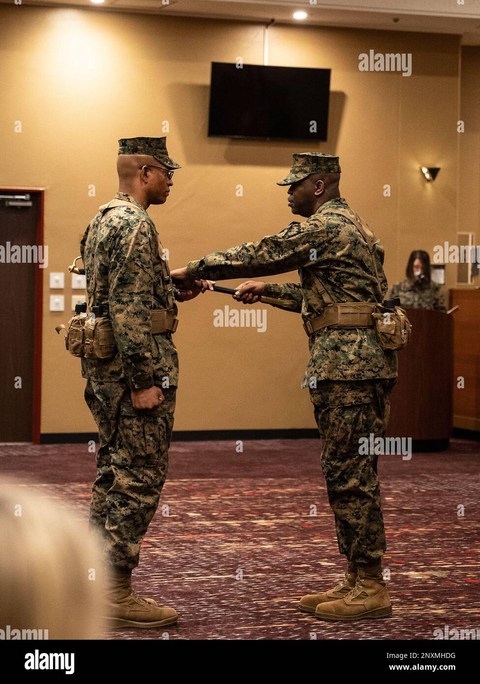 U.S. Marine Corps Sgt. Maj. Charles B. Peoples, right, outgoing sergeant major of 3rd ...