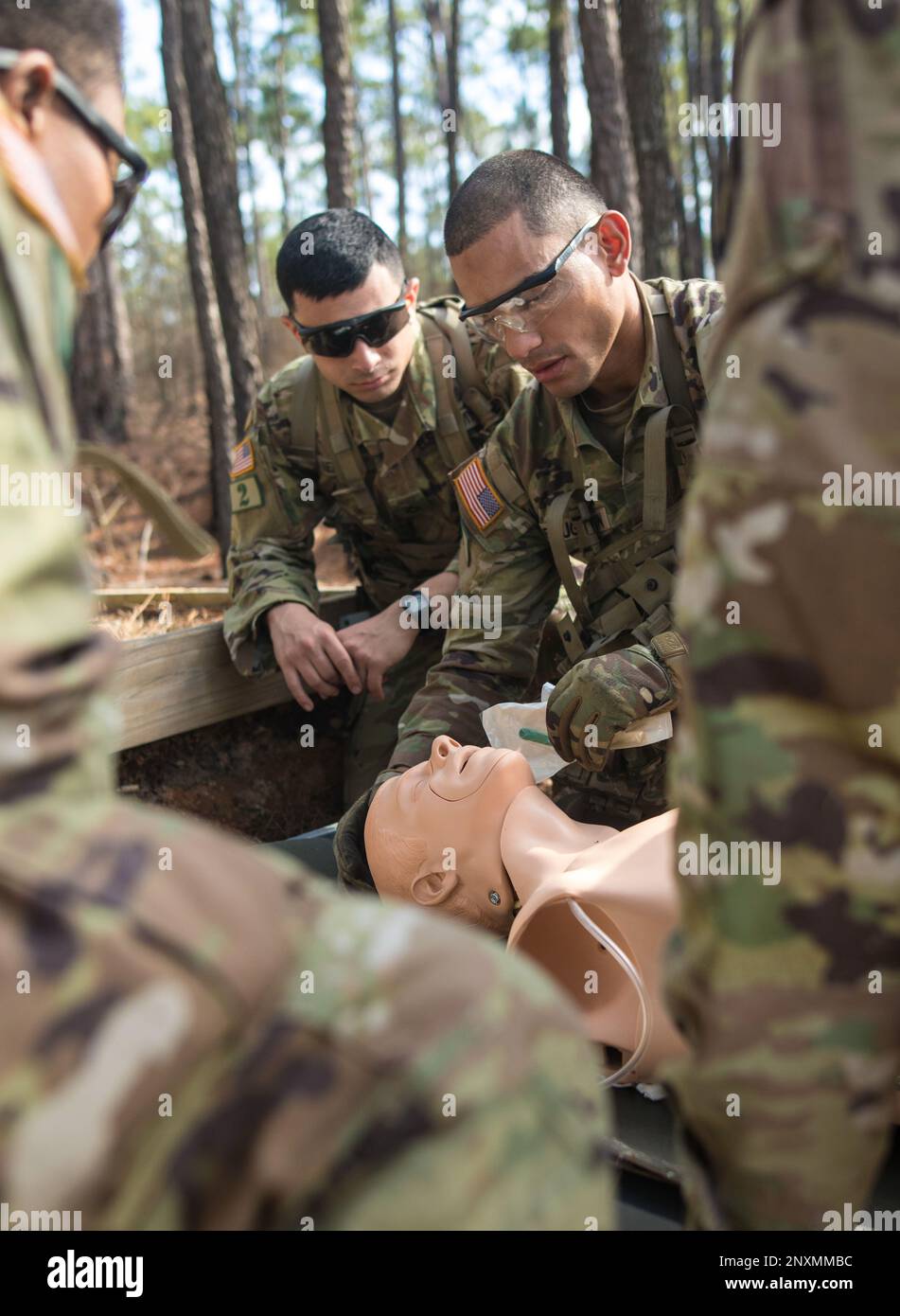 Soldiers from 2nd Squad performs first aid during the Combined Brigade ...