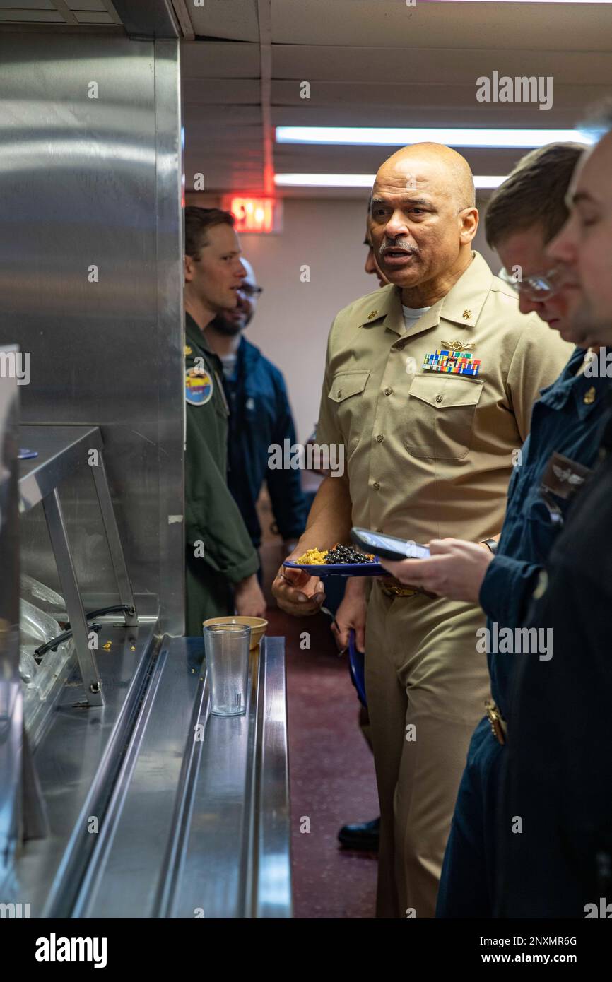Retired U.S. Army Chief Warrant Officer 5 Phillip Brashear meets with the crew of the Wasp-class ...