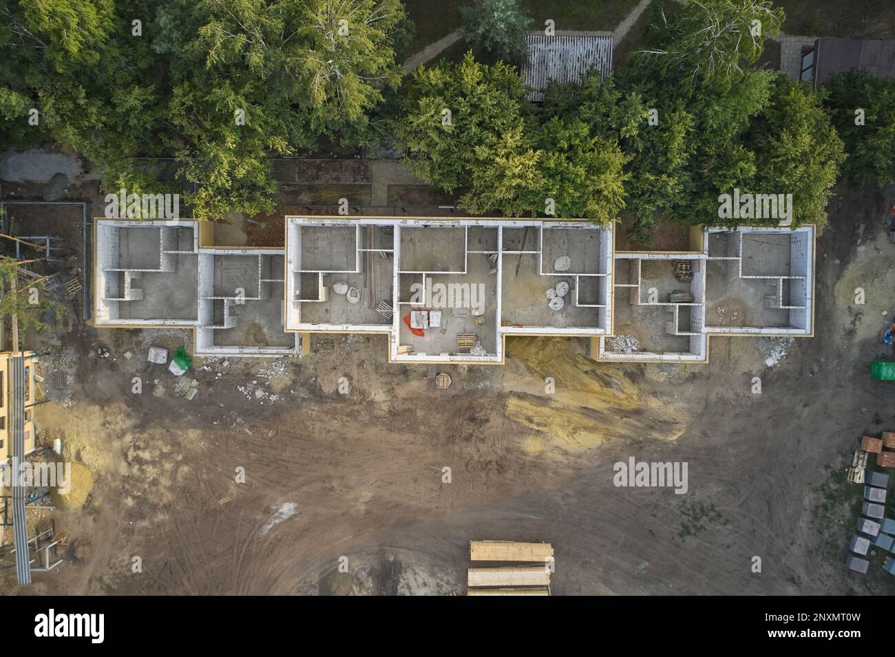 Aerial view of the construction of a small building Stock Photo - Alamy