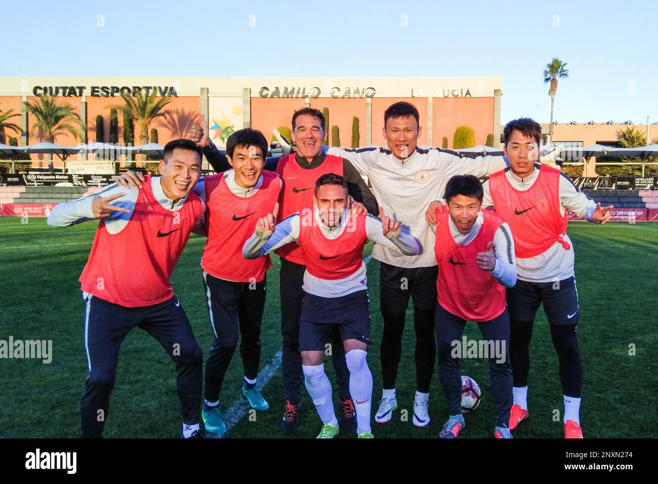 Players of China's Beijing Renhe F.C. pose for photos during the winter ...