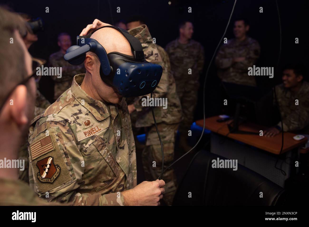 Col. Calvin Powell, 39th Air Base Wing commander, equips a virtual ...