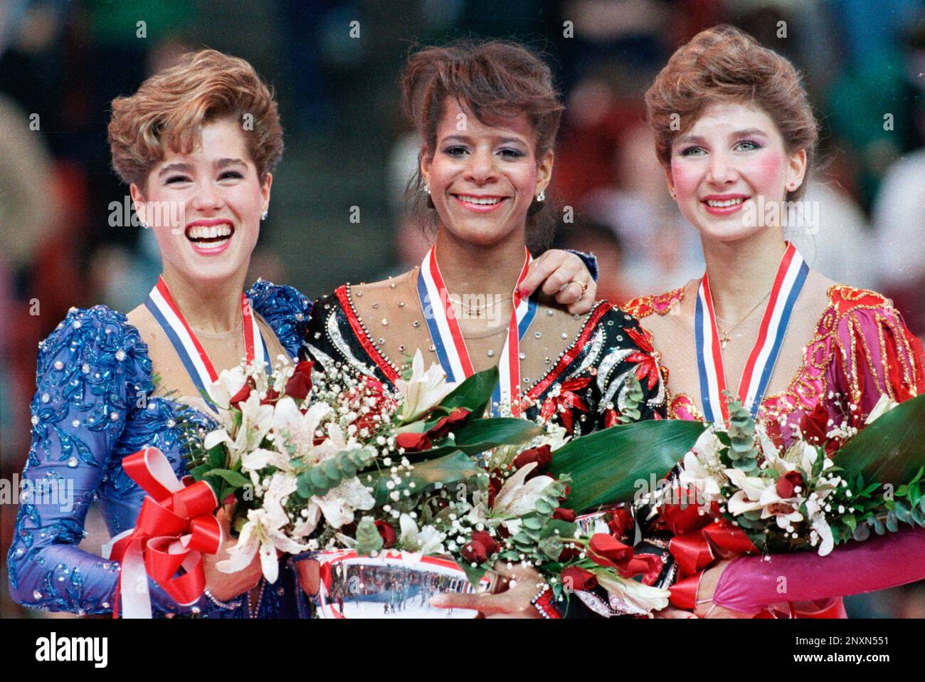 Gold medalist Debi Thomas (C), Silver medalist Jill Trenary (L) and ...