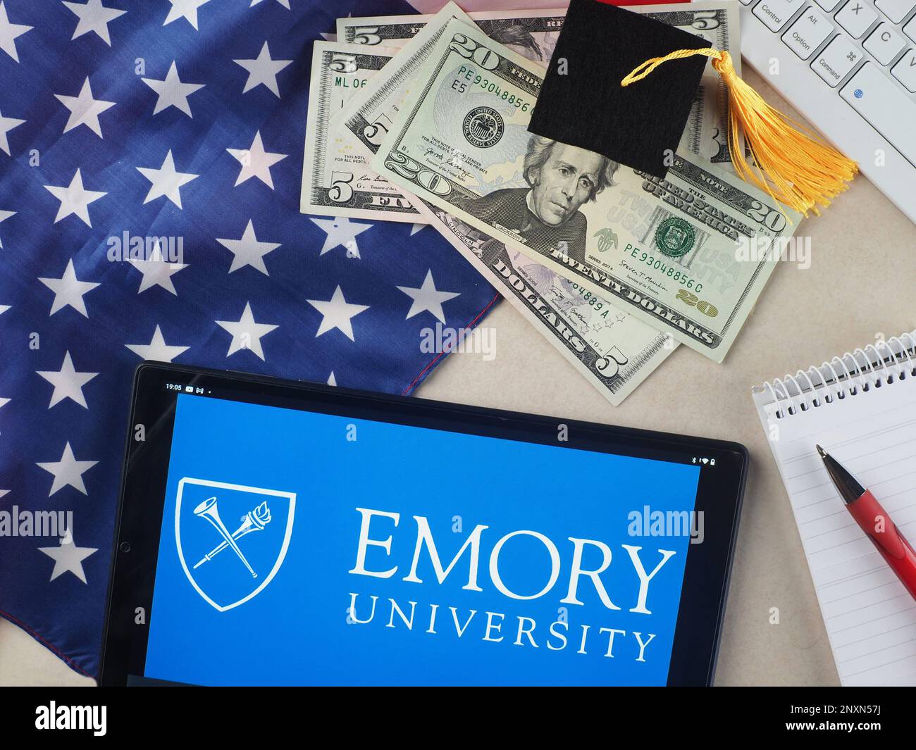 In this photo illustration, Emory University logo seen displayed on a ...