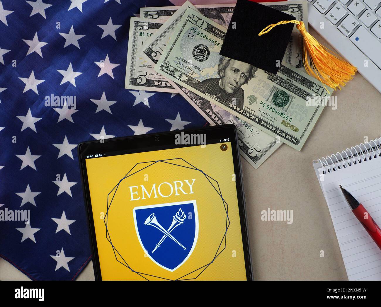 In this photo illustration, Emory University logo seen displayed on a ...