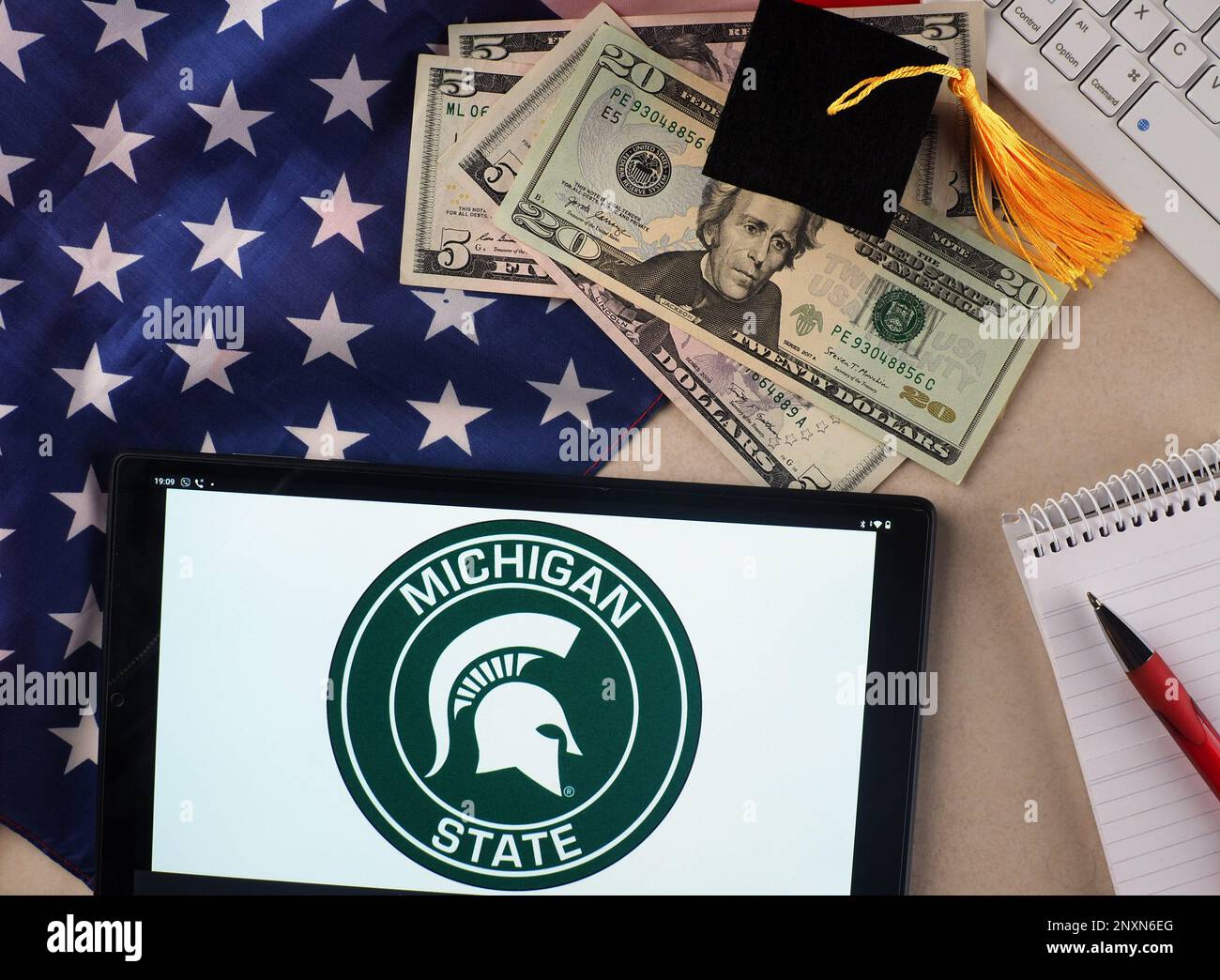 In this photo illustration, Michigan State University logo seen ...