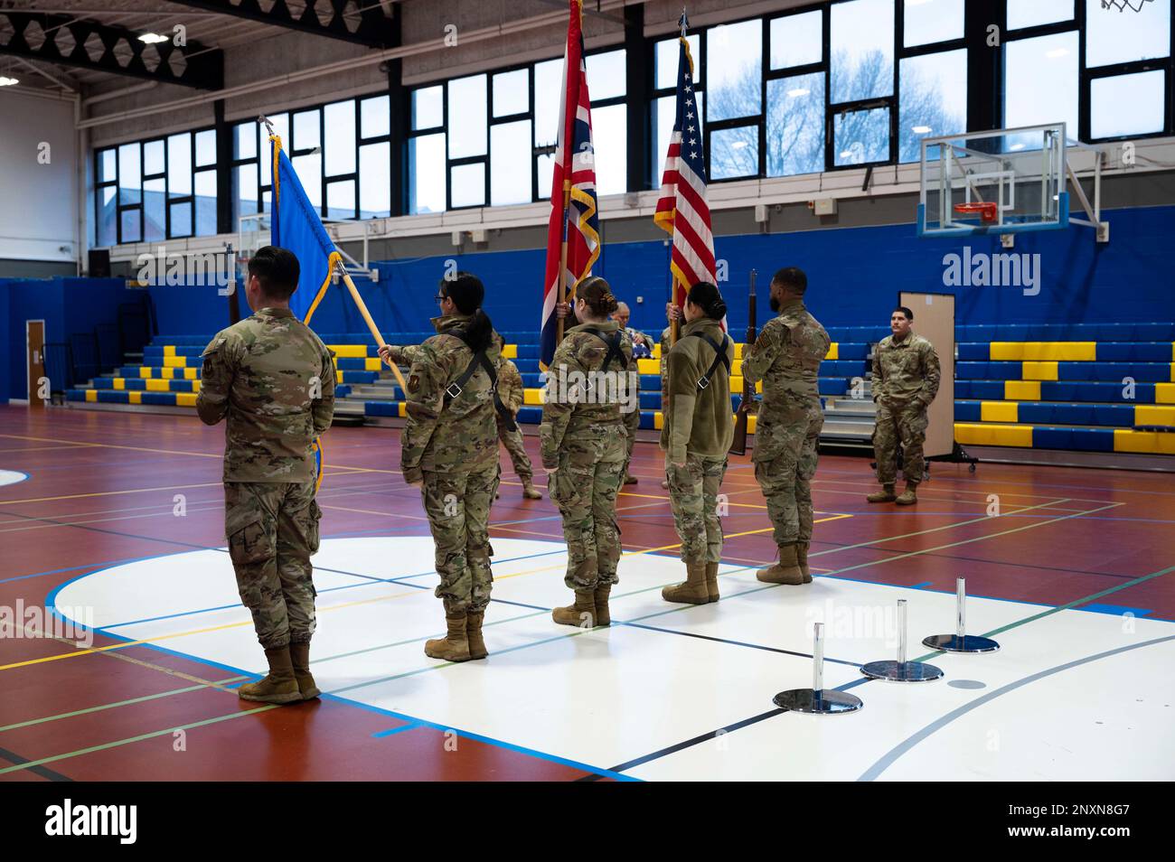 Base honor guardsmen practice presenting the colors at Royal Air Force ...