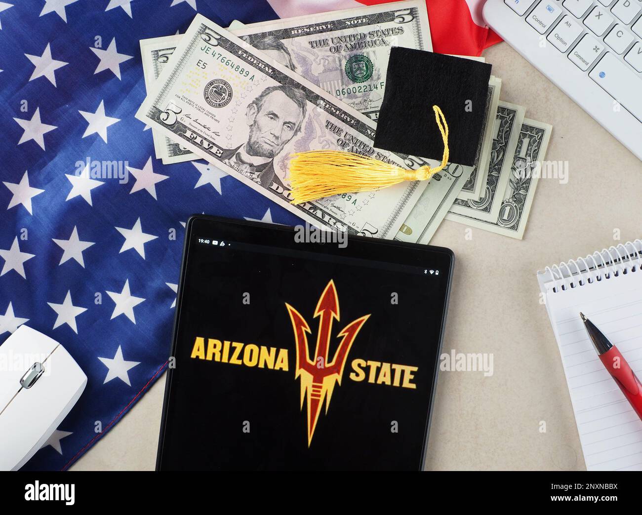 In this photo illustration, Arizona State University logo seen ...