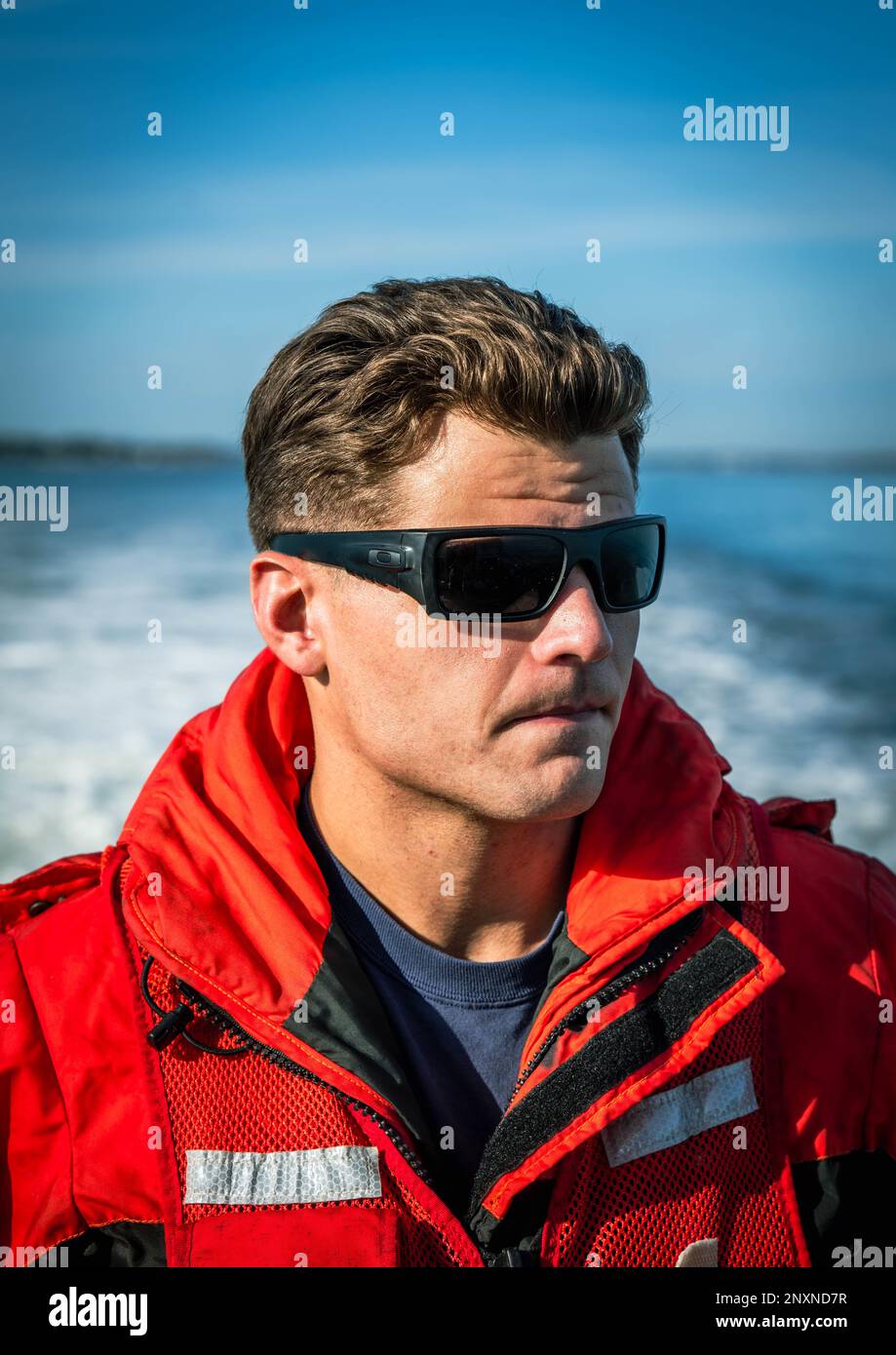 U.S. Coast Guard Seaman Eric Buckle, a boat crew member with Station ...