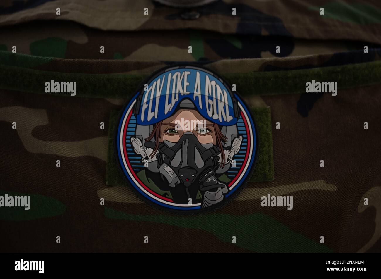 A "Fly Like A Girl" morale patch attached to an aircrew members ...
