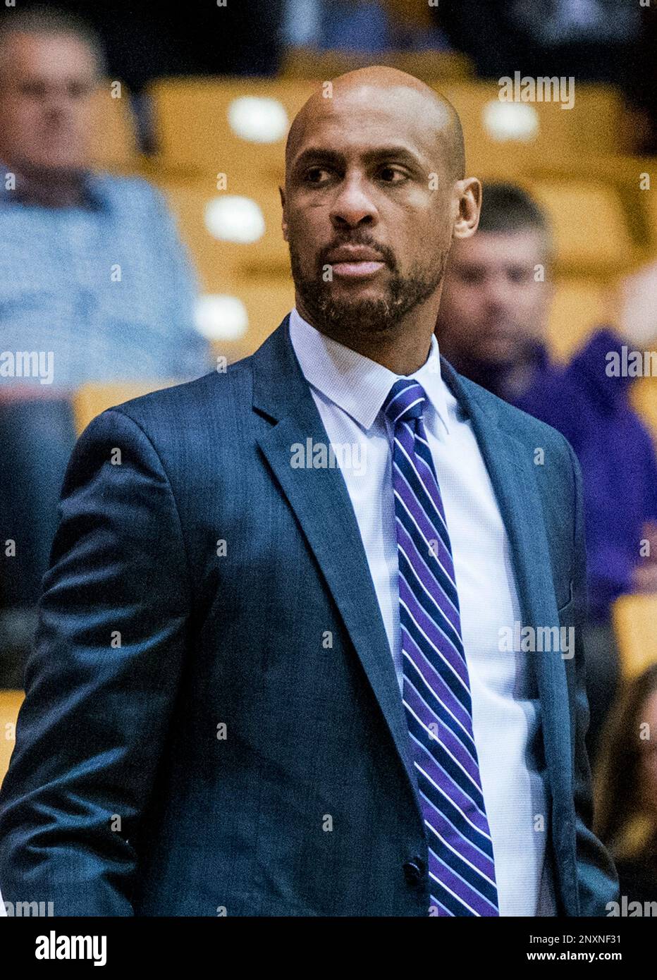 James Madison head coach Louis Rowe watches as his team inbounds the ...
